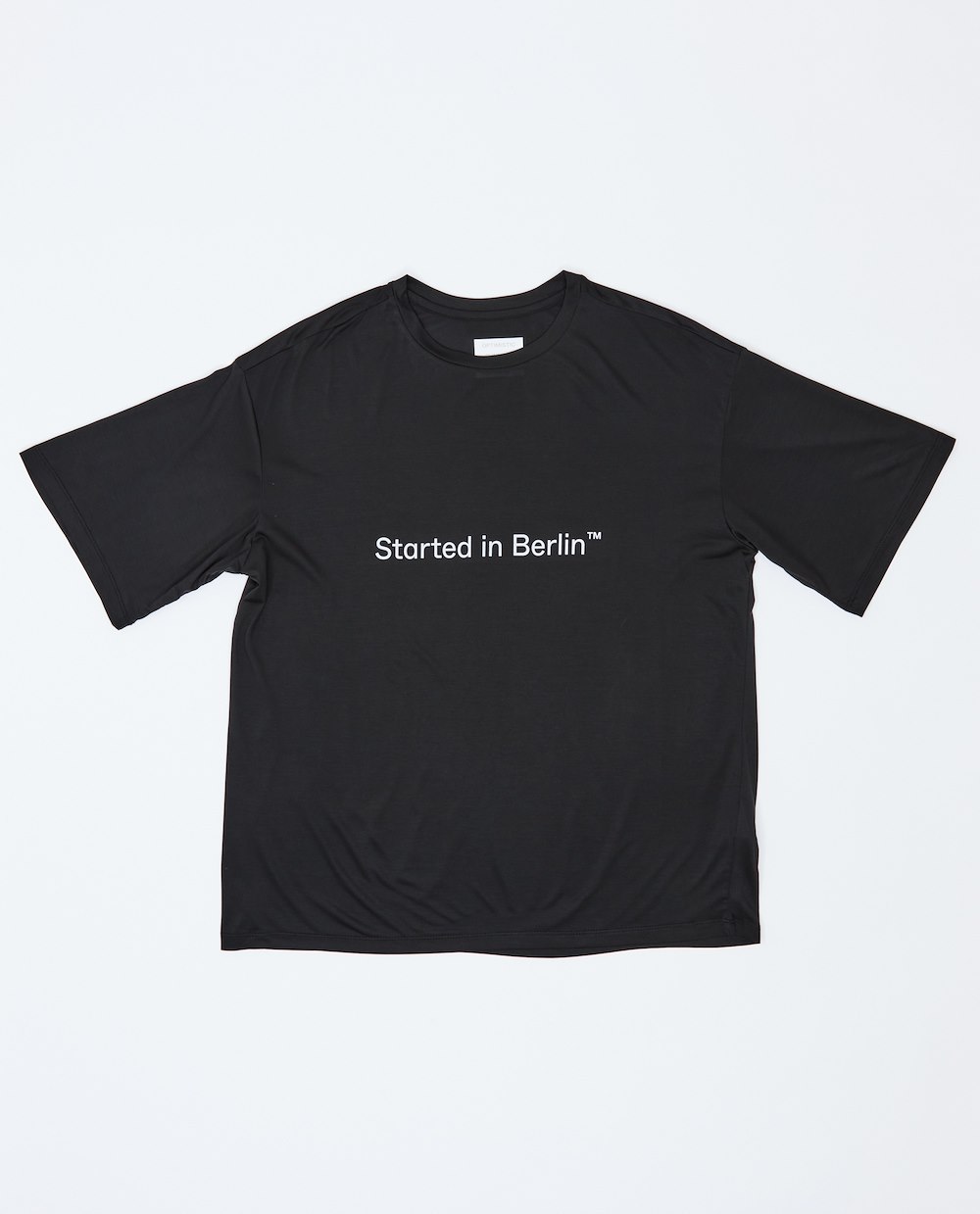 OPTIMISTIC RUNNERS 리사이클드 스타티드 인 베를린 티셔츠 - 페칭